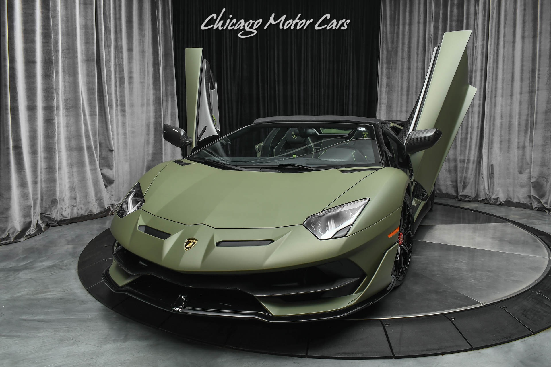 Green Lamborghini Aventador Roadster