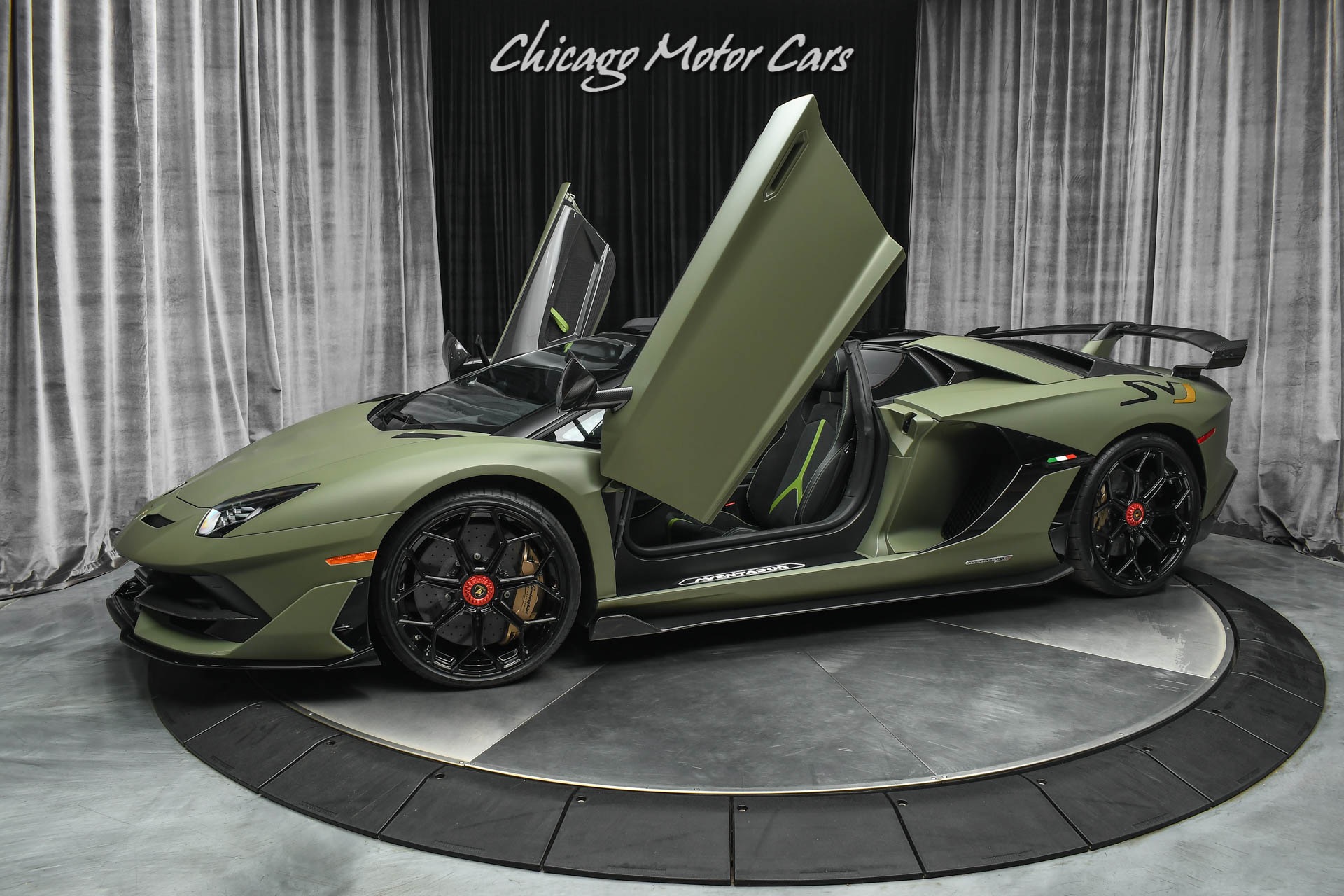 Green Lamborghini Aventador Roadster